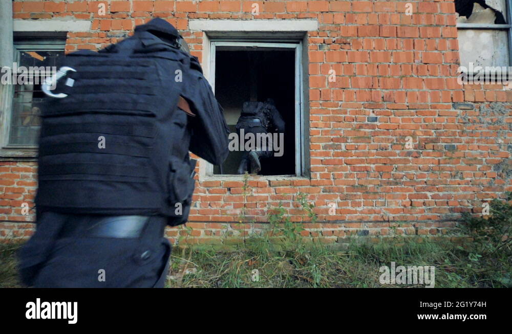 Black swat team uniform Stock Videos & Footage - HD and 4K Video Clips ...
