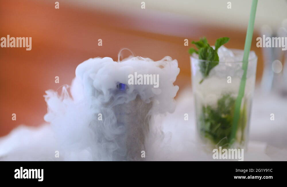 Dry Ice in Glass While bartender preparing drink Stock Video Footage ...
