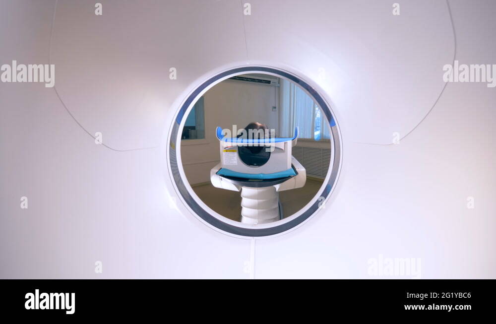 Tomograph, MRI, MRI scanner. Patient on magnetic resonance imaging ...