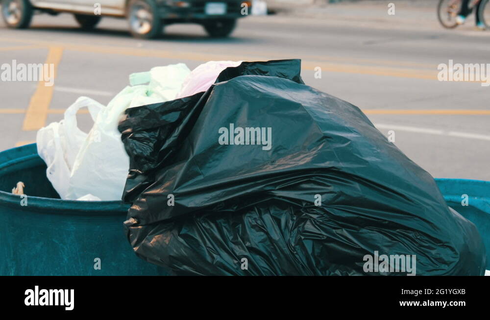 Full garbage can Stock Videos & Footage - HD and 4K Video Clips - Alamy