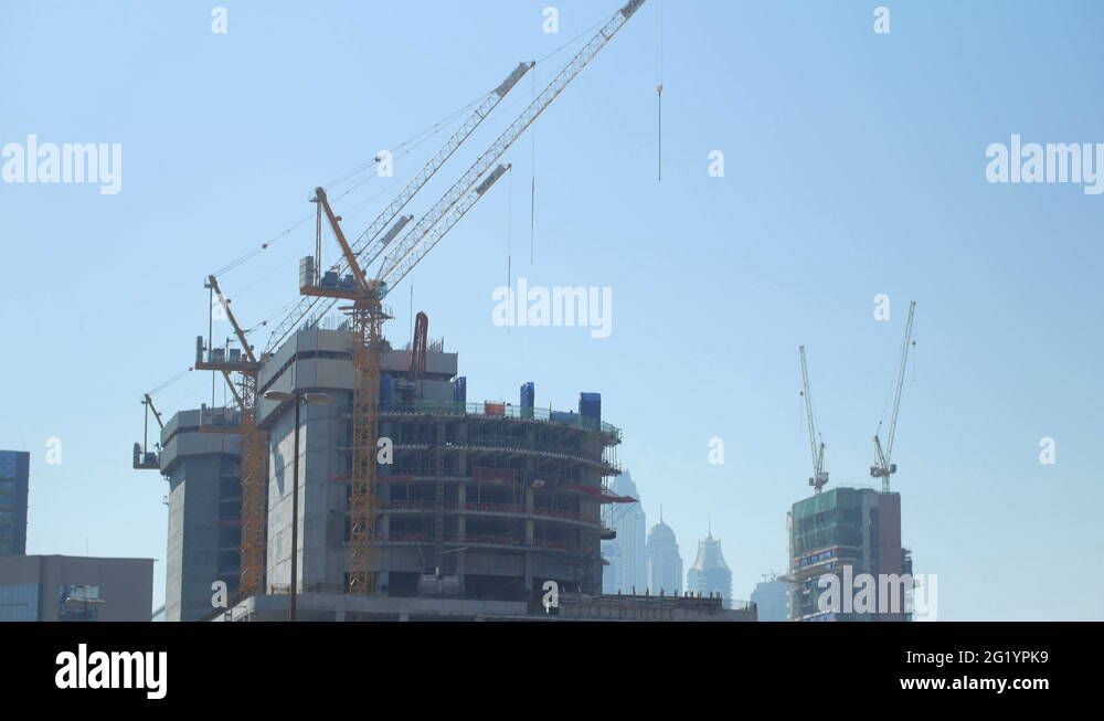 Huge construction cranes Stock Videos & Footage - HD and 4K Video Clips ...