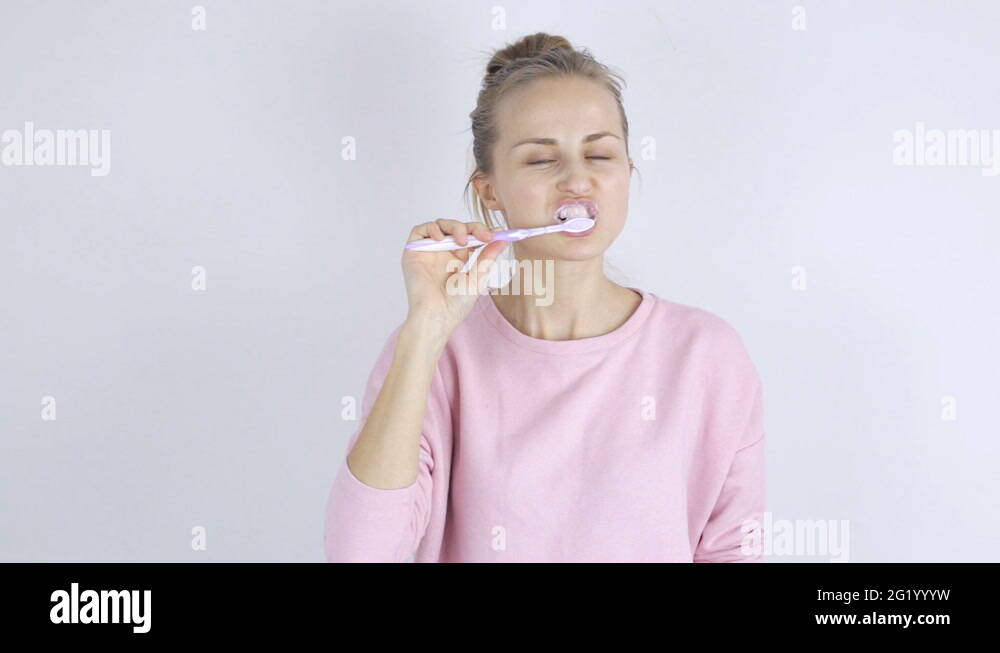 Young woman brushing teeth toothbrush care Stock Videos & Footage - HD ...