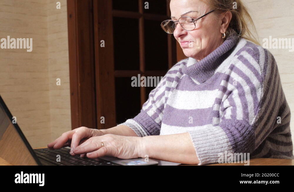 Granny with computer Stock Videos & Footage - HD and 4K Video Clips - Alamy
