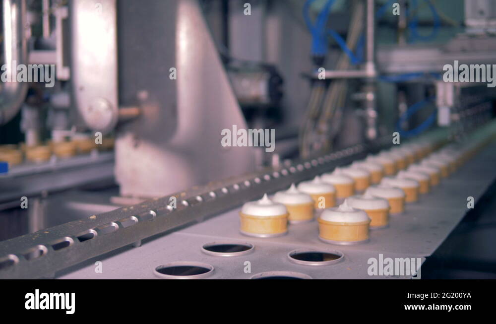 Manufacturing process at ice-cream factory. Ice-cream production ...