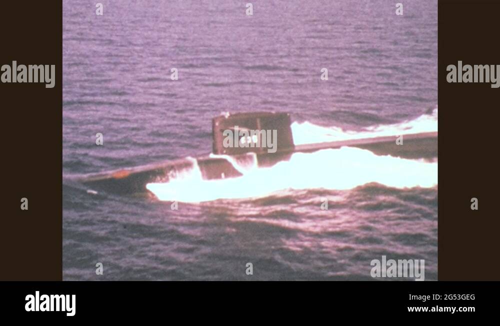 1970s: UNITED STATES: USS Whale (SSN-638) submarine surfaces in ocean ...