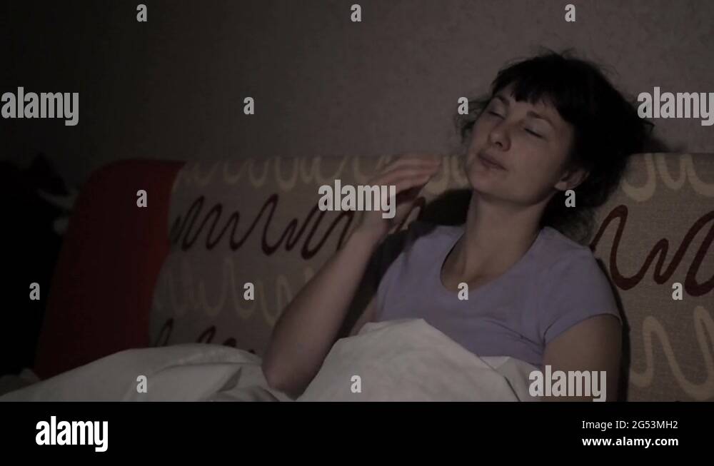 Sick girl lying bed sad night home room Stock Videos & Footage - HD and ...