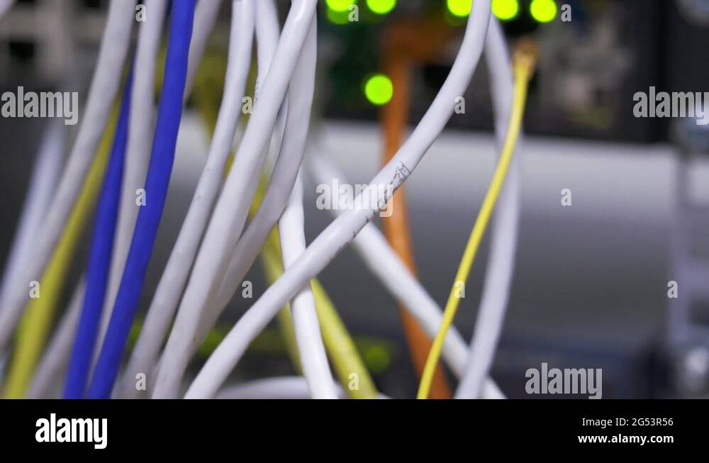Network cables connected to a hub in server room at the data centre ...