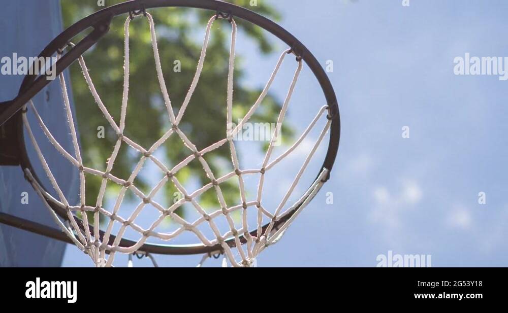Basketball hoop with blue sky background 4k Stock Video Footage - Alamy
