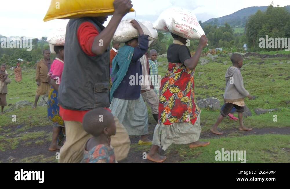 African people carrying sacks on their heads Stock Video Footage - Alamy