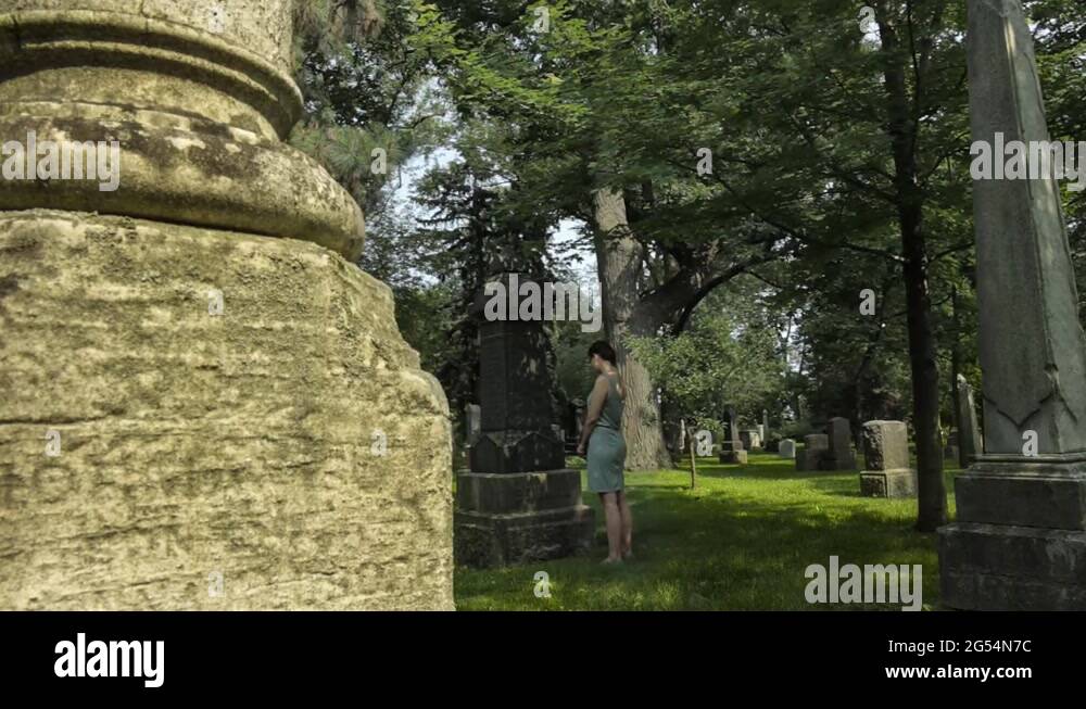 Mourning grave widow Stock Videos & Footage - HD and 4K Video Clips - Alamy