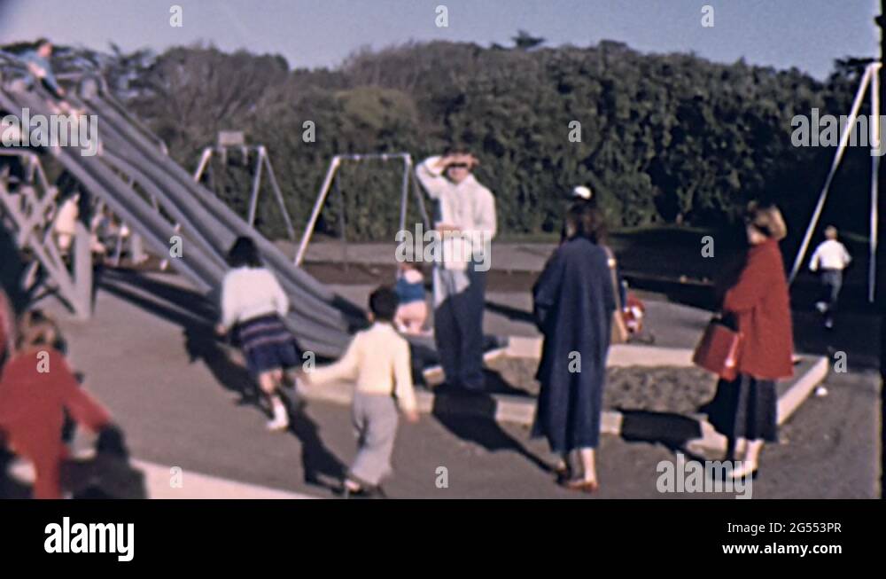 1970s Children Play on Slide Playground Kids Playing Vintage Film Old ...