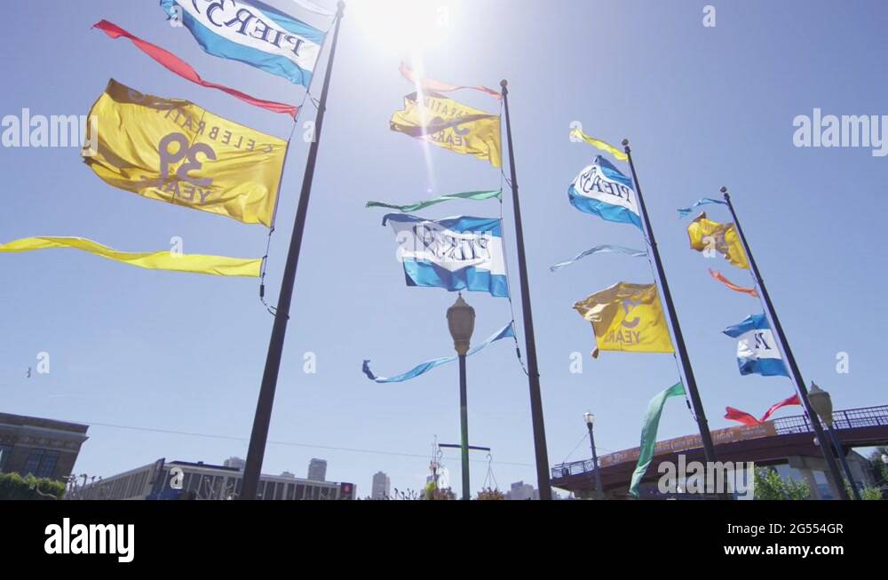 Low angle of flags waving Stock Video Footage - Alamy