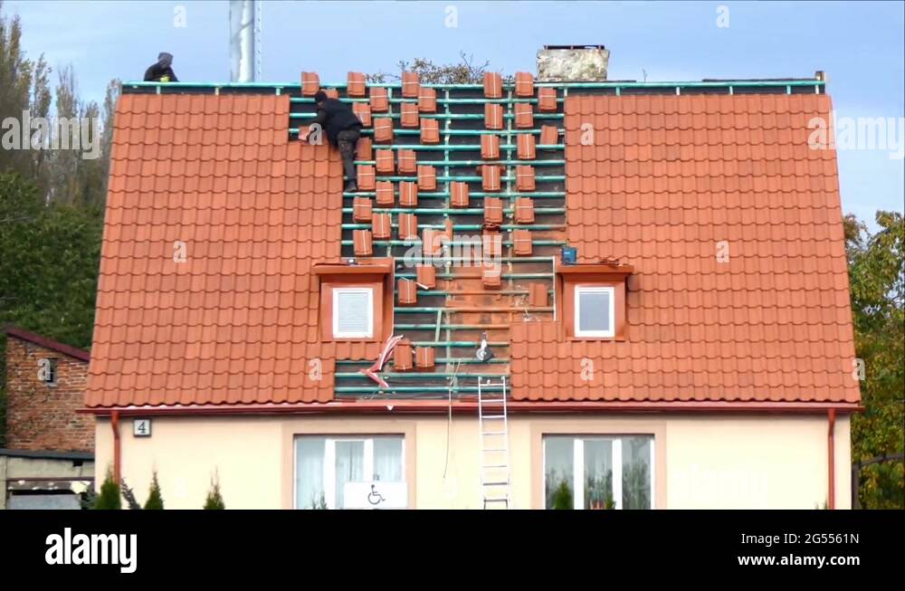 Builder repairing roof Stock Videos & Footage - HD and 4K Video Clips ...