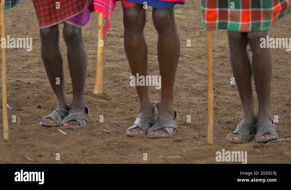 Legs of Maasai men performing a traditional jumping dance Stock Video ...
