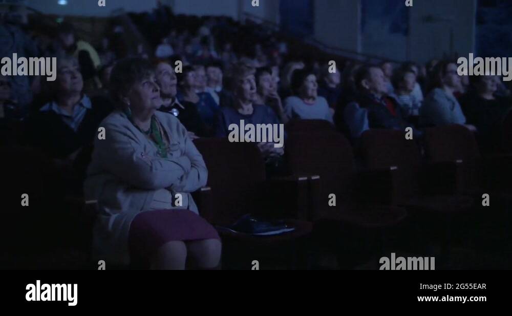 Audience in dark cinema hall Stock Video Footage - Alamy