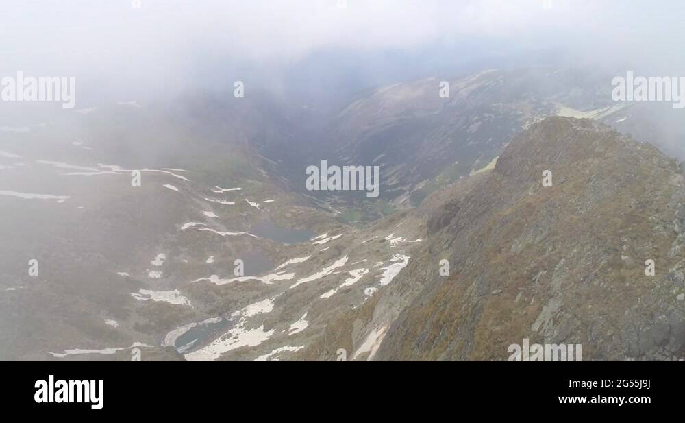 Woman sitting on cliff edge Stock Videos & Footage - HD and 4K Video ...