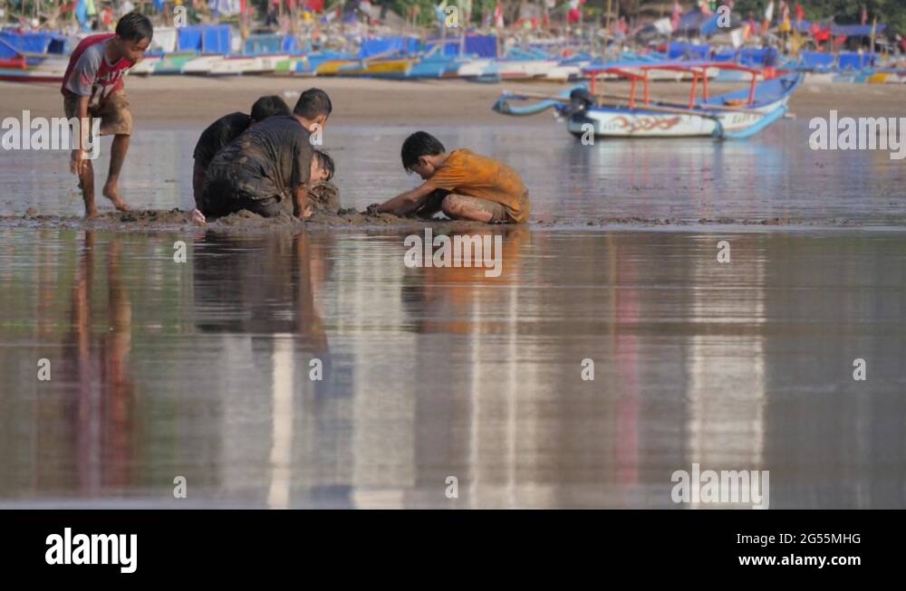 Boys playing on beach Stock Videos & Footage - HD and 4K Video Clips ...