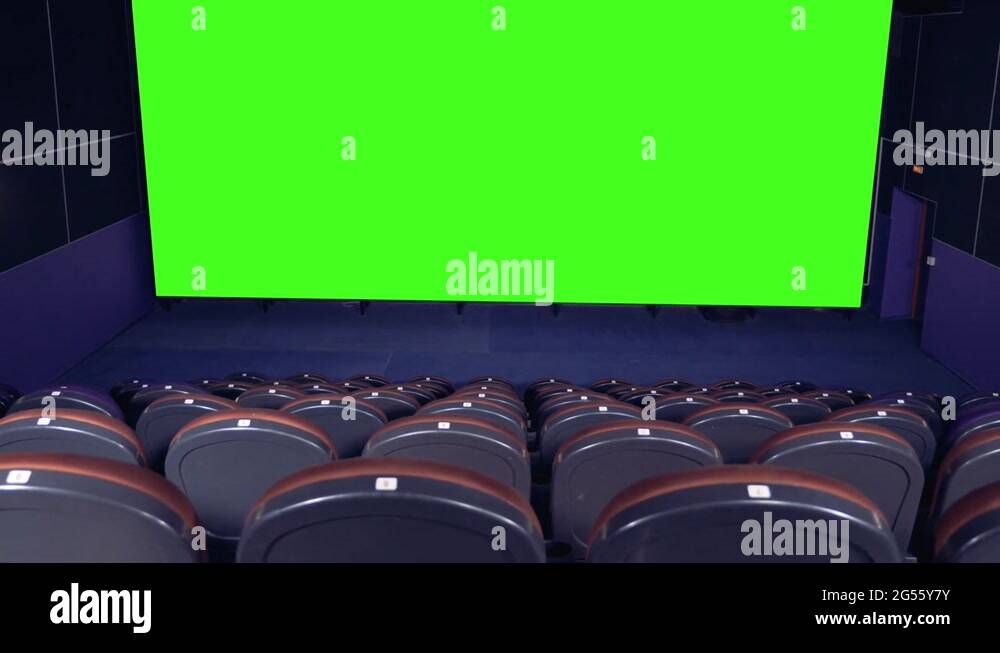 Blank movie theater screen with green screen background in empty cinema ...