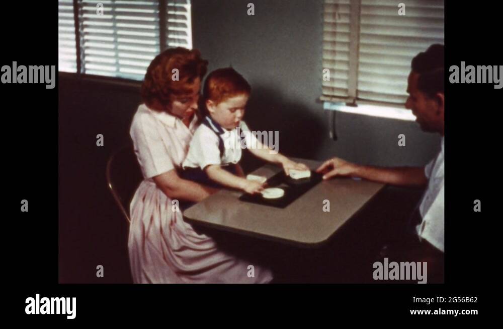 UNITED STATES 1950s: Child Attempts Form Board and Reverse Form Board ...