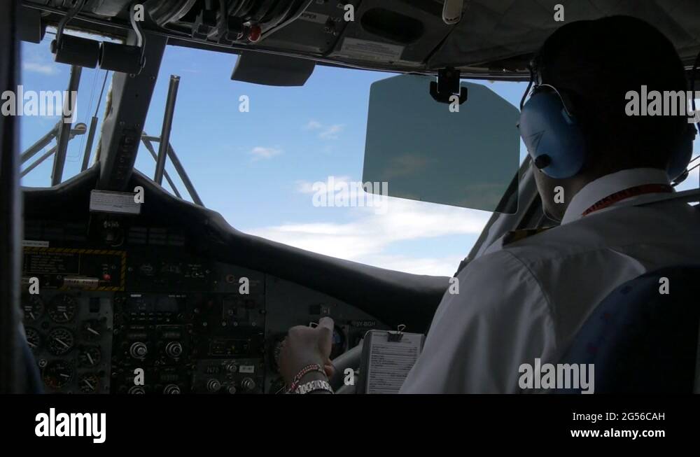 Co-pilot talking to the pilot inside the cockpit Stock Video Footage ...