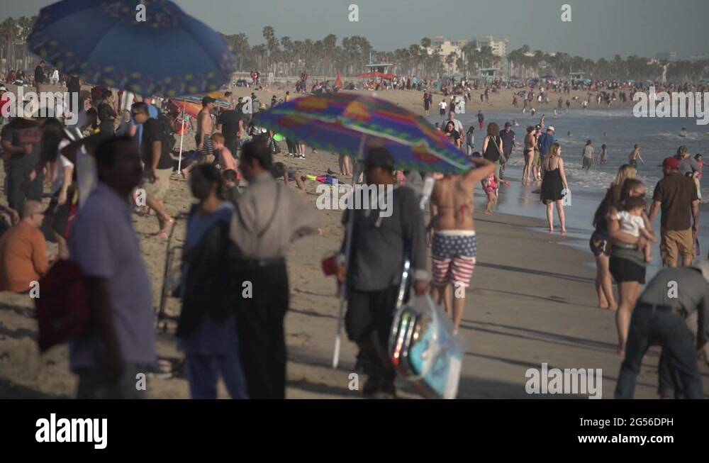 Crowd on the beach Stock Videos & Footage - HD and 4K Video Clips - Alamy