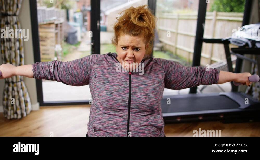 Woman straining lift weights Stock Videos & Footage - HD and 4K Video ...