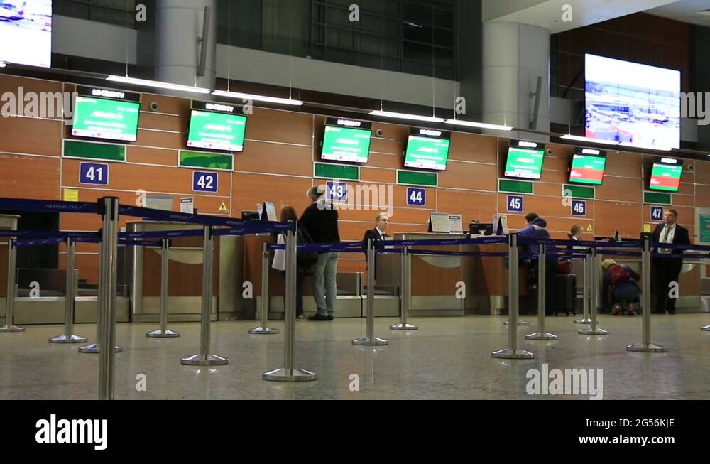 Airport check in counters airport check in counter Stock Videos ...