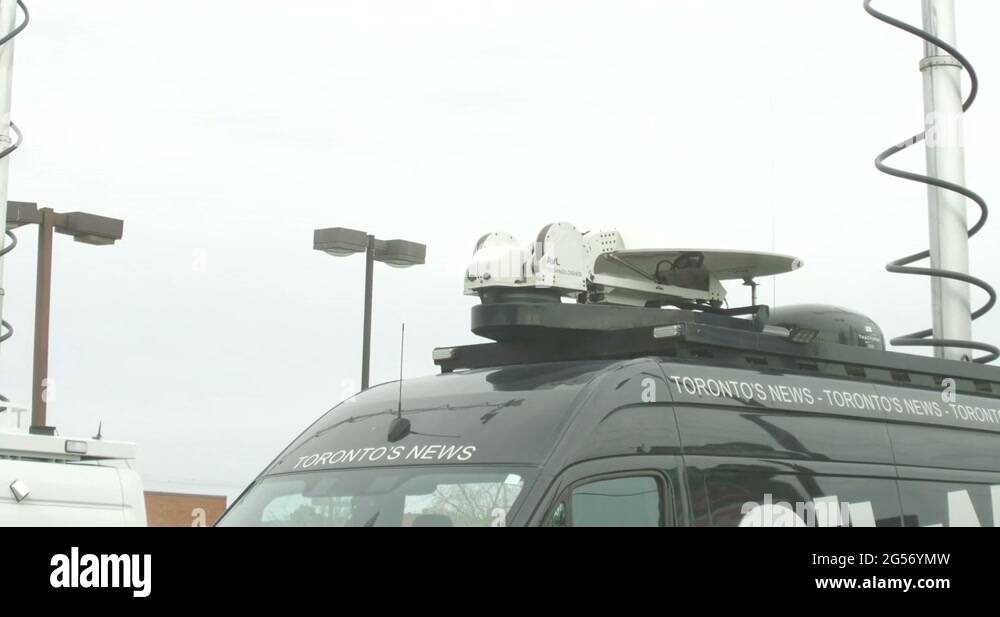 TV news broadcast live trucks with antenna and satellite transmitters ...