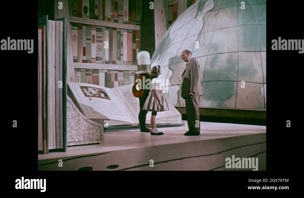 1960s: People in Library with Giant Globe and Books Stock Video Footage ...