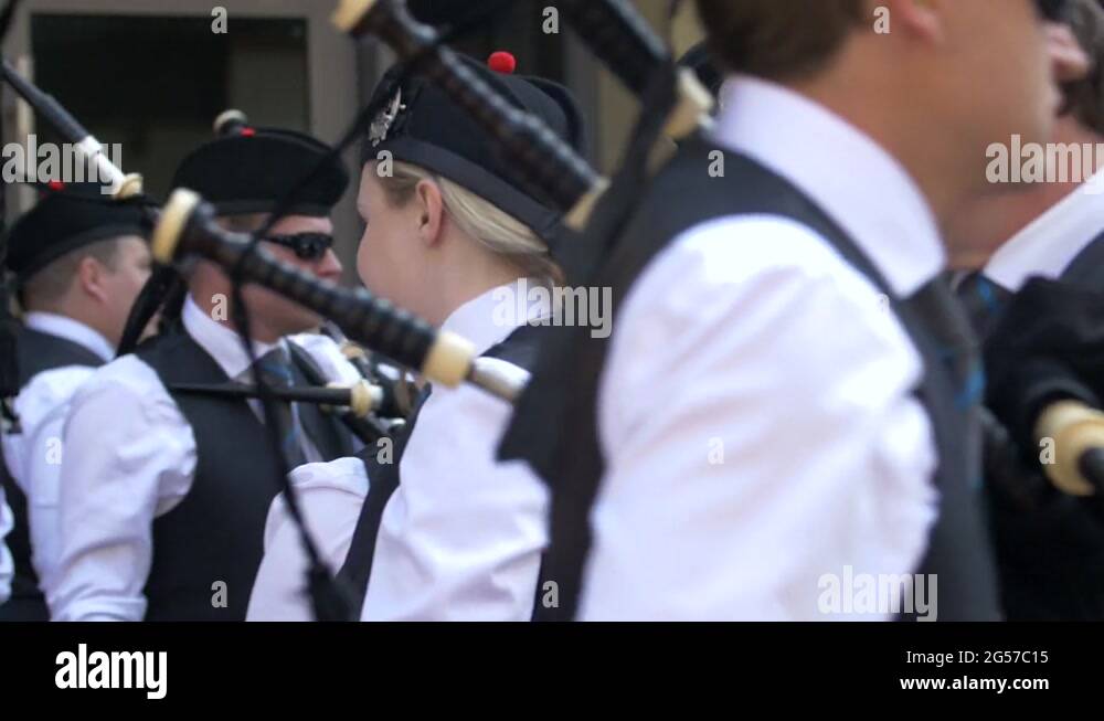 People in uniforms walking on a street Stock Video Footage - Alamy