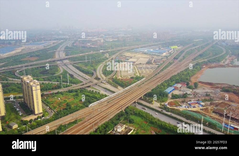 day time wuhan city car and train traffic junction aerial panorama 4k ...