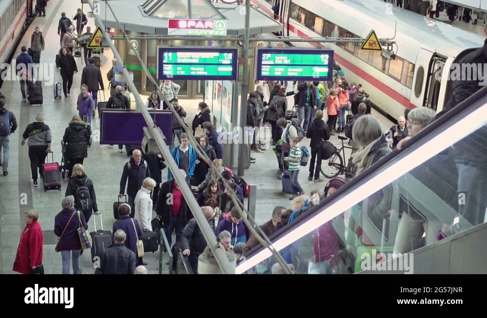 People crowd on the railway station terminal Stock Video Footage - Alamy