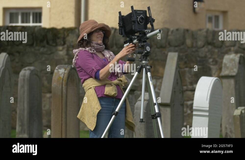 Adjusting a camera Stock Videos & Footage - HD and 4K Video Clips - Alamy
