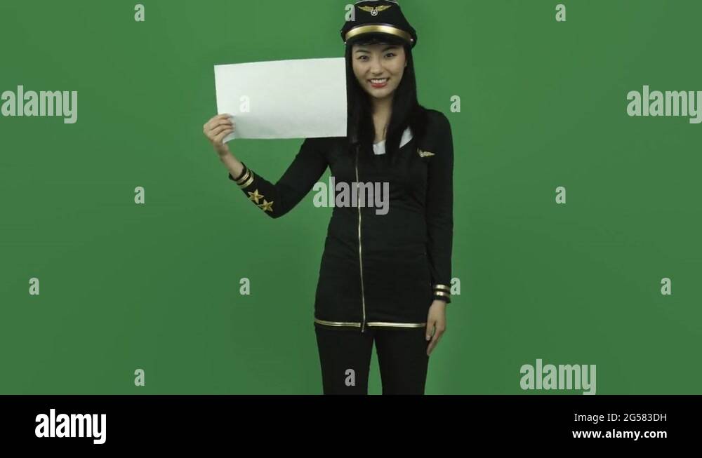 Asian air hostess isolated greenscreen green background confident blank ...