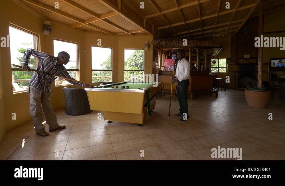 African men playing pool Stock Video Footage - Alamy
