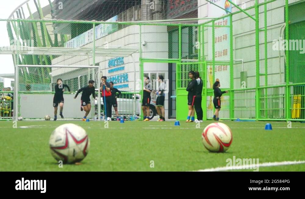Chinese female middle school students are training to play football ...