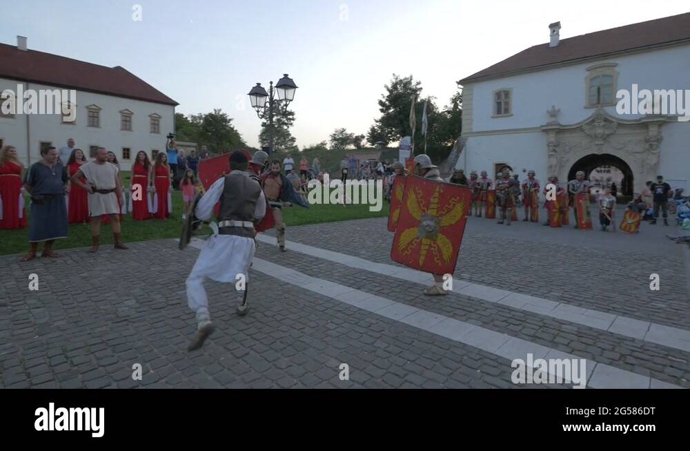 Soldiers in medieval armors demonstrating a fight Stock Video Footage ...