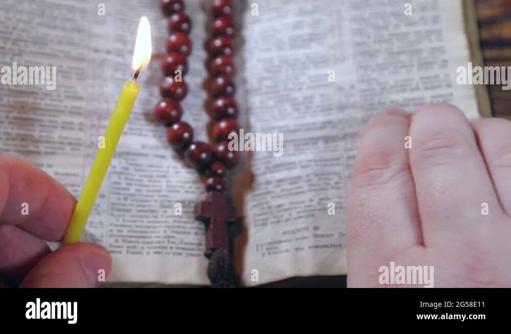 Bible praying hands holding cross Stock Videos & Footage - HD and 4K ...