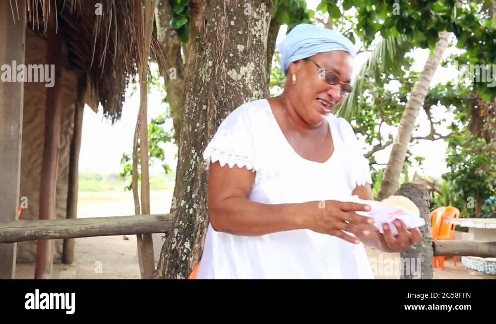 Bahiana serving a typical food in Brazil called Acaraje Stock Video ...