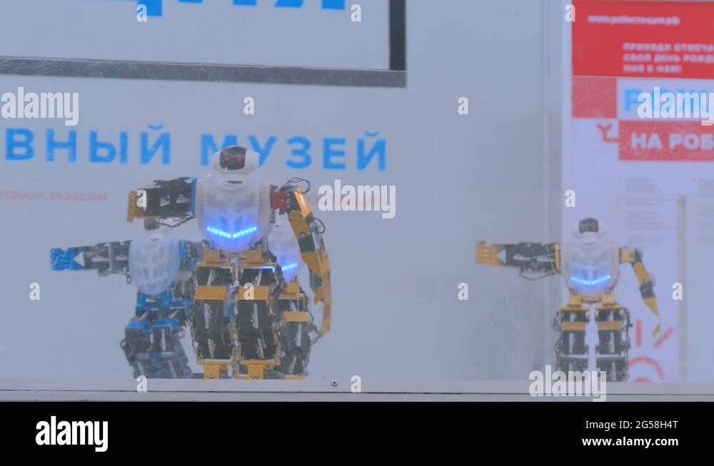 Humanoid robots dancing at robotic show Stock Video Footage - Alamy