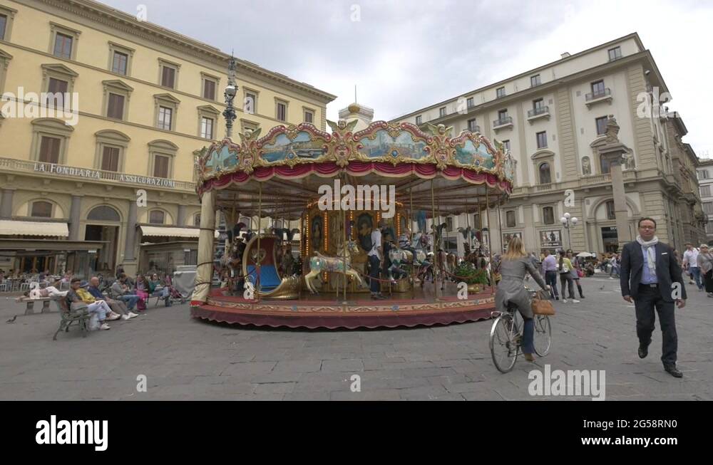 A carousel in a square Stock Video Footage - Alamy