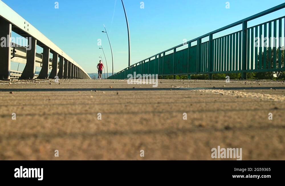 Athlete running on bridge Stock Videos & Footage - HD and 4K Video ...