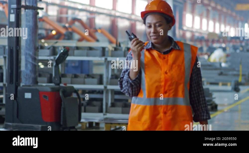 Female factory worker talking Stock Videos & Footage - HD and 4K Video ...