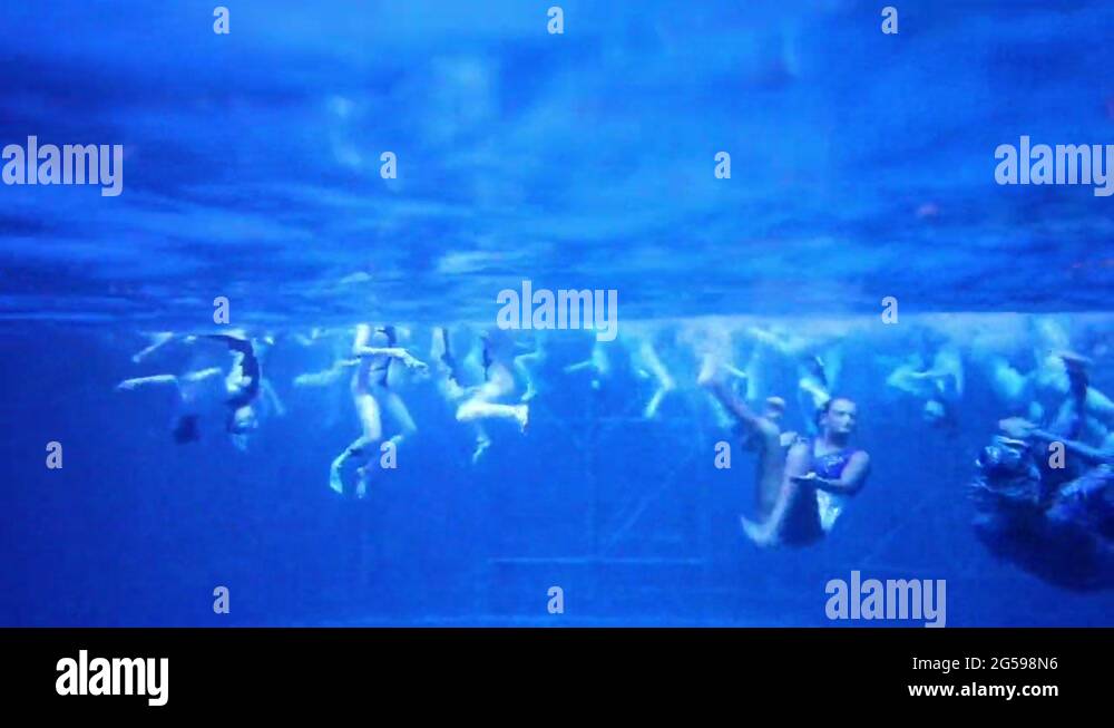 Actors on stage and synchronized swimmers at Swimming Pool Stock Video ...