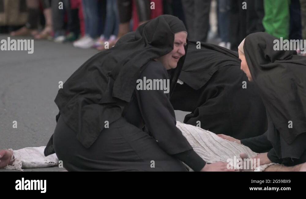 Women crying and mourning over Jesus Stock Video Footage - Alamy