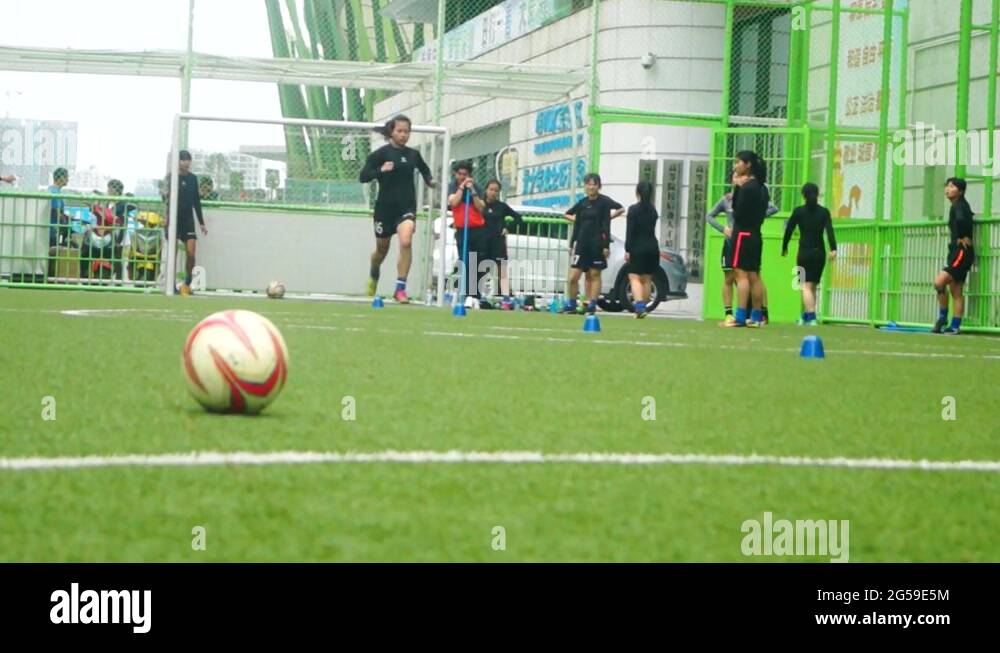 Chinese female middle school students are training to play football ...