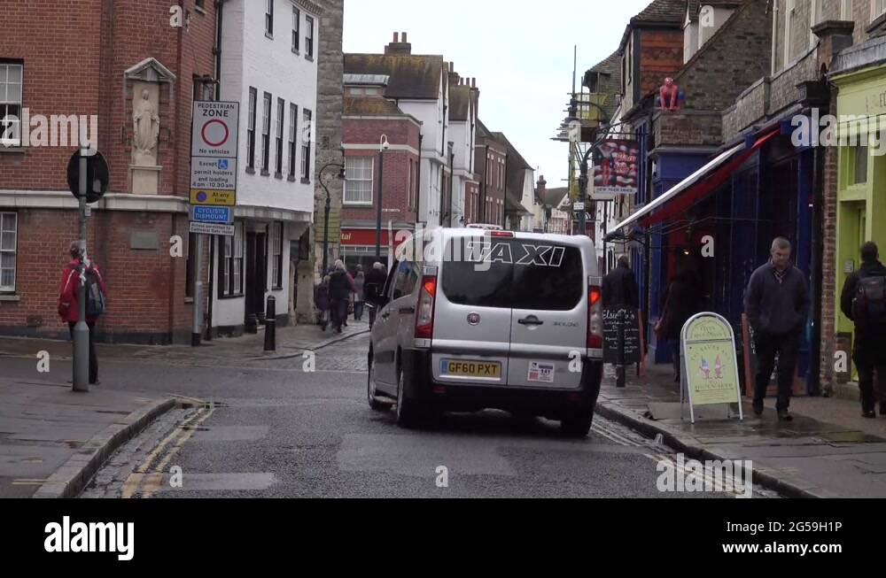 Town center taxi Stock Videos & Footage - HD and 4K Video Clips - Alamy