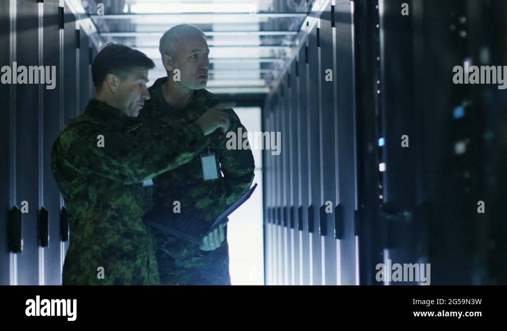 In Data Center Two Military Men Work with Open Server Rack Cabinet ...