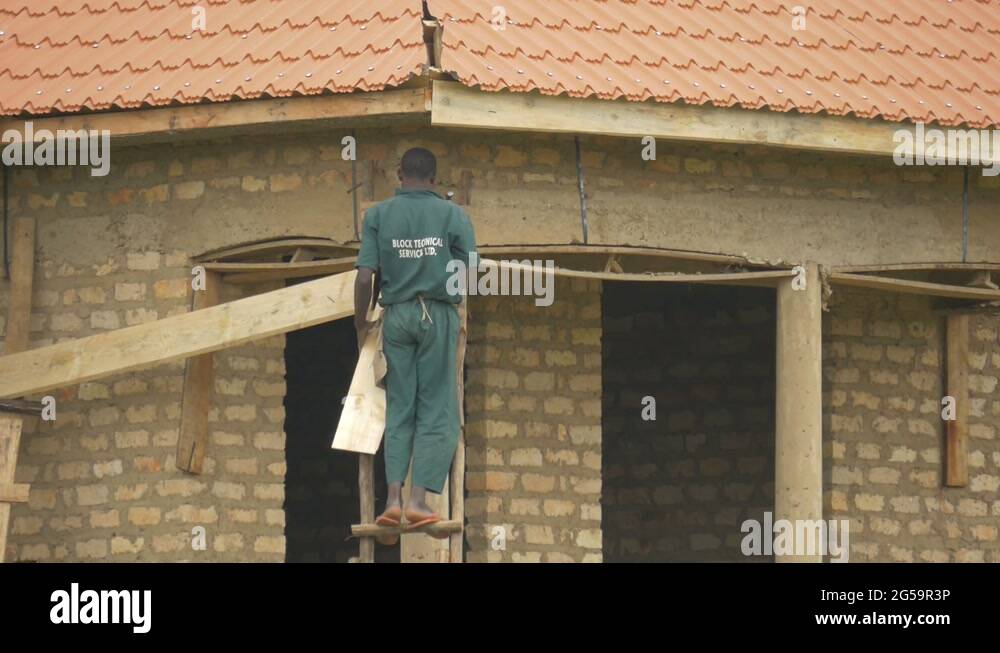 Builder building a house african Stock Videos & Footage - HD and 4K ...