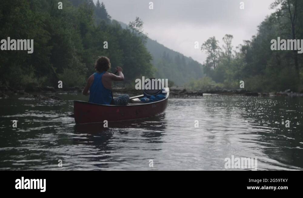 Man rowing canoe in Stock Videos & Footage - HD and 4K Video Clips - Alamy